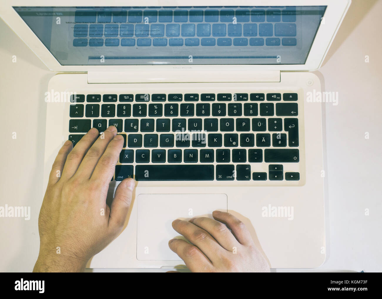 Using an Apple Laptop Computer top view, Vienna Austria 9.11.2017 Stock ...