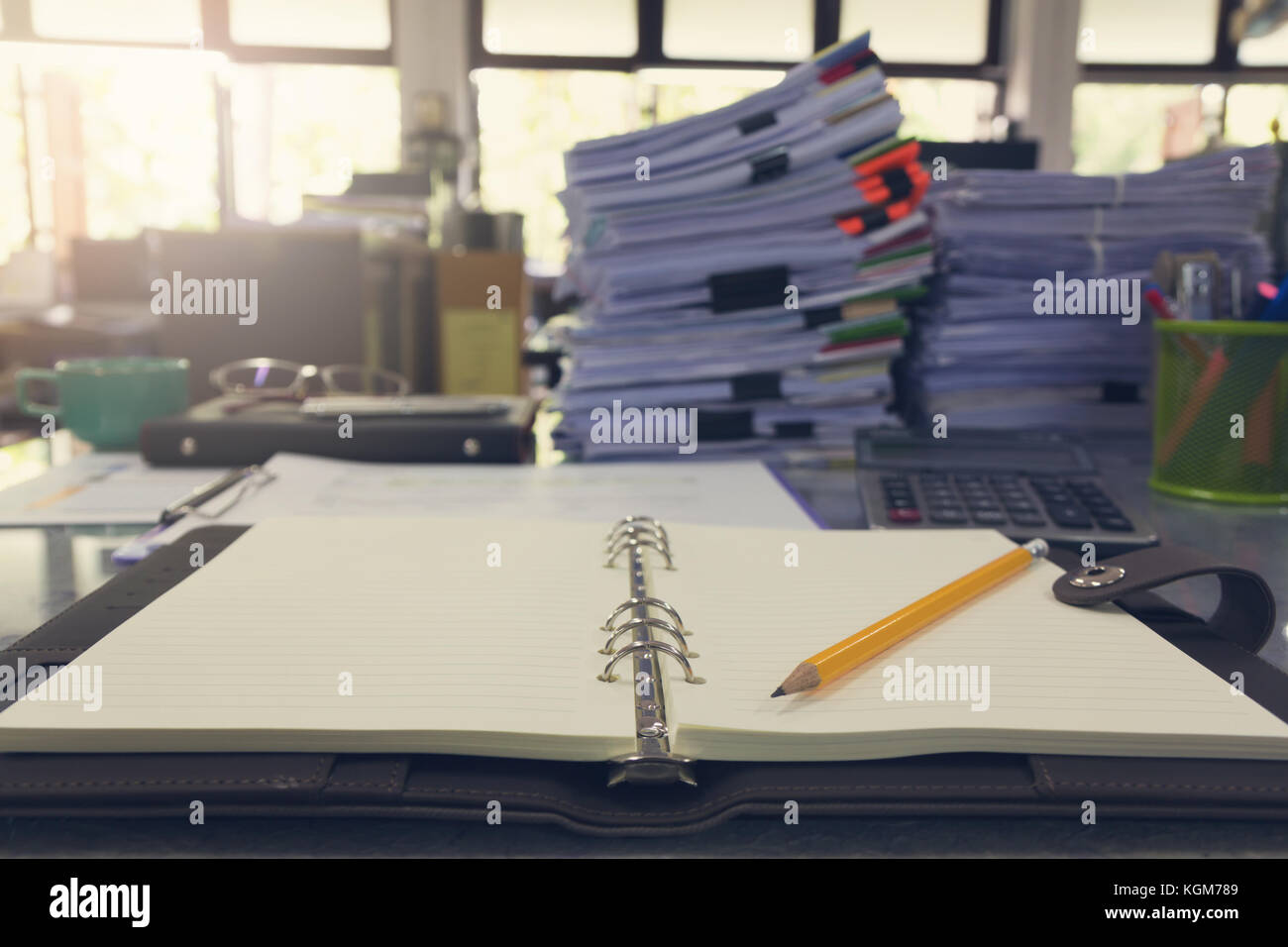 Business and finance concept of Pencil and notebook on office desk with ...