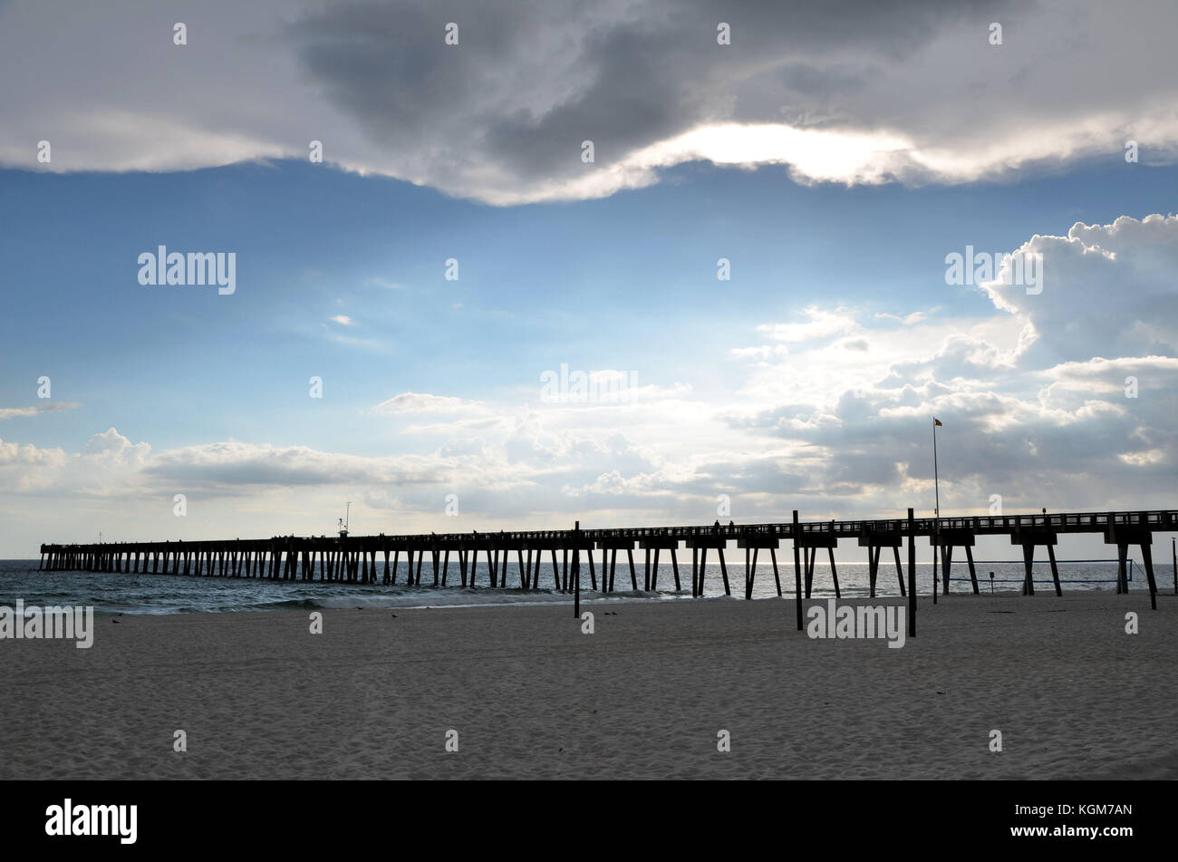 Sunset at a pier Stock Photo - Alamy