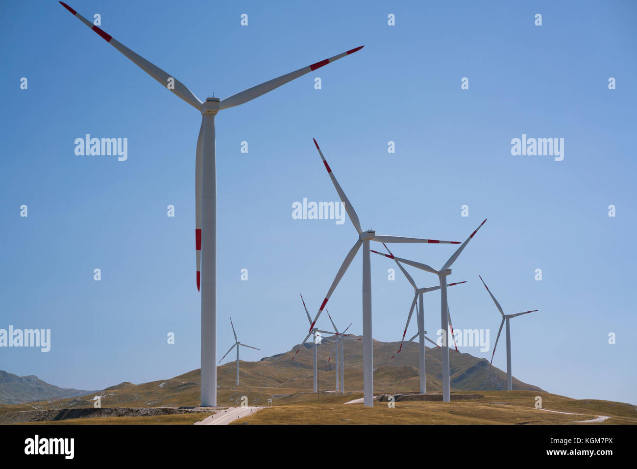 Windmills converting wind energy into electricity Stock Photo - Alamy