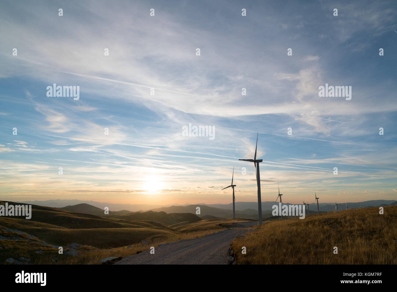 Windmills converting wind energy into electricity Stock Photo - Alamy