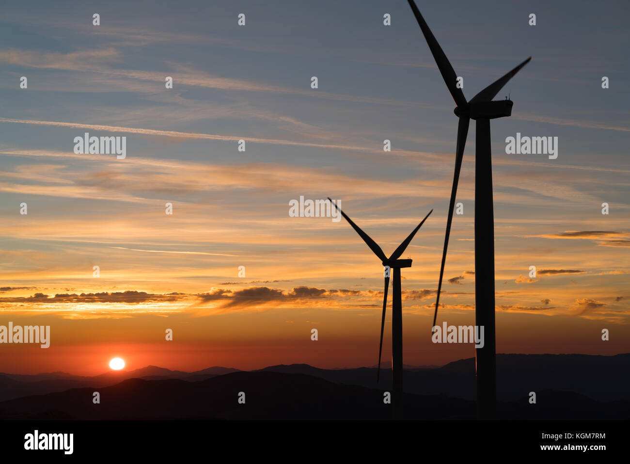 Windmills converting wind energy into electricity Stock Photo - Alamy