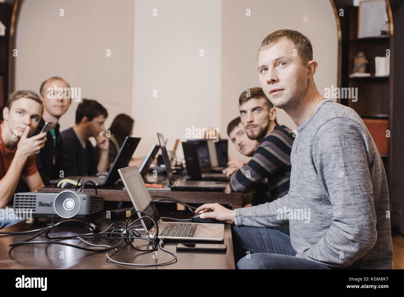 Group of people watching presentation in classroom Stock Photo - Alamy