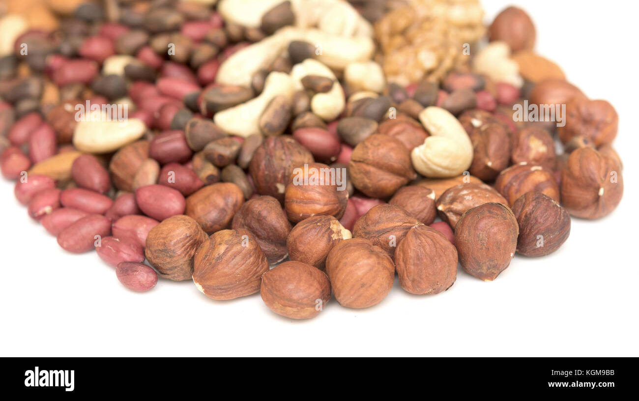 mixed nuts isolated on white background Stock Photo - Alamy