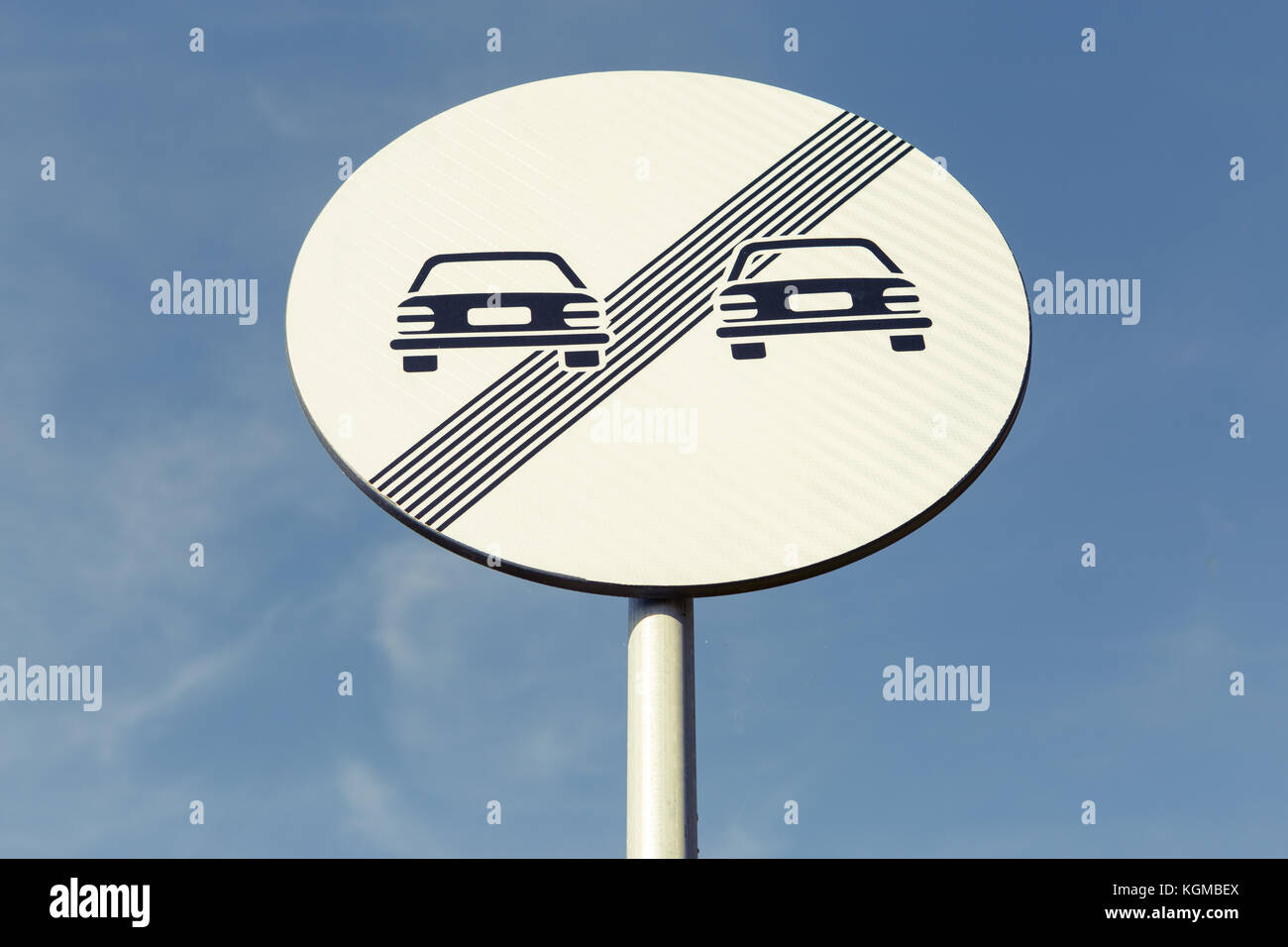 No more restrictions road sign on blue sky background as street traffic ...