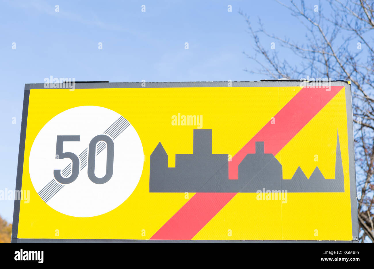 European city limit road sign with end of speed restriction Stock Photo ...