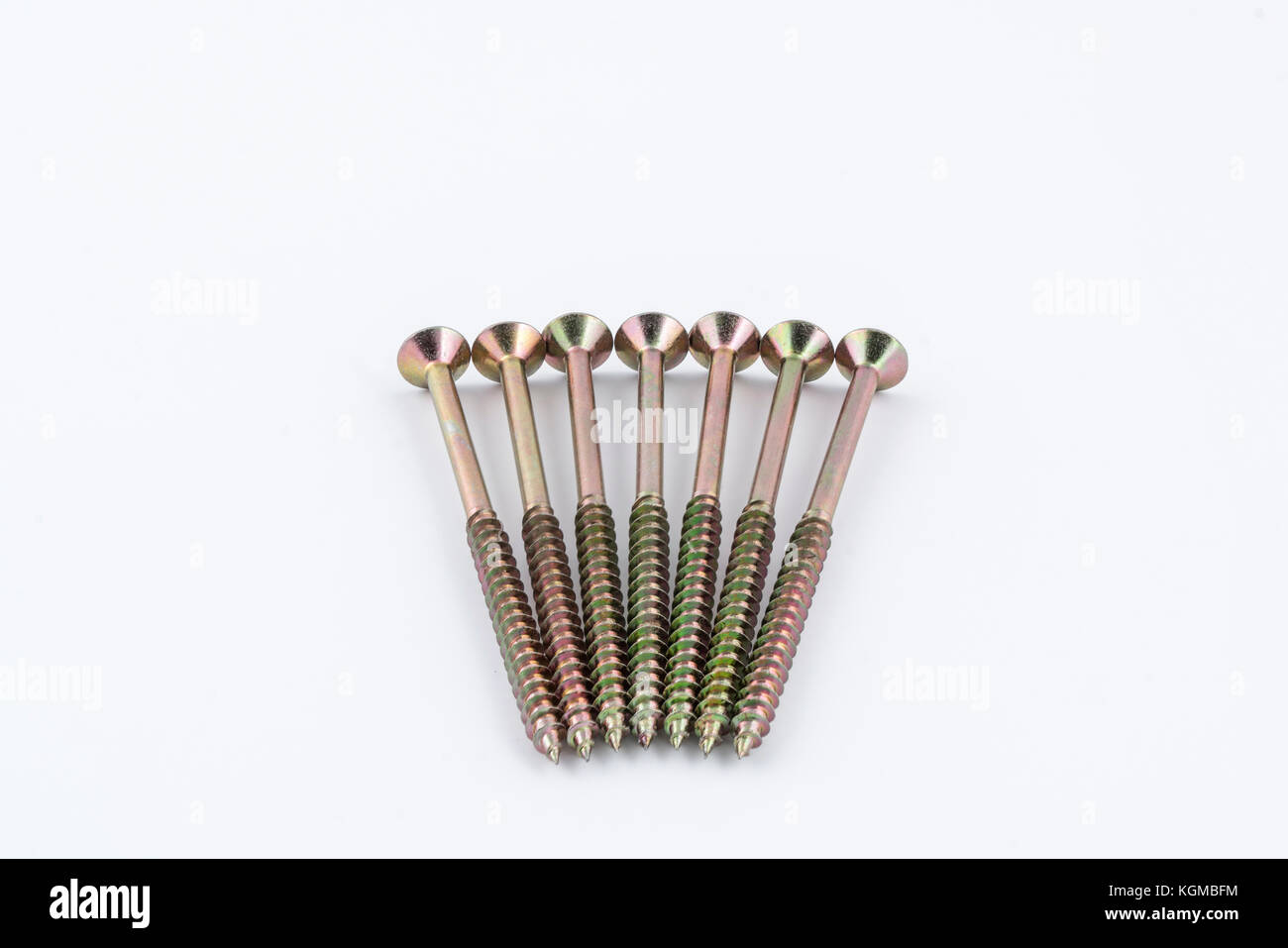 Some screws on a white background Stock Photo - Alamy