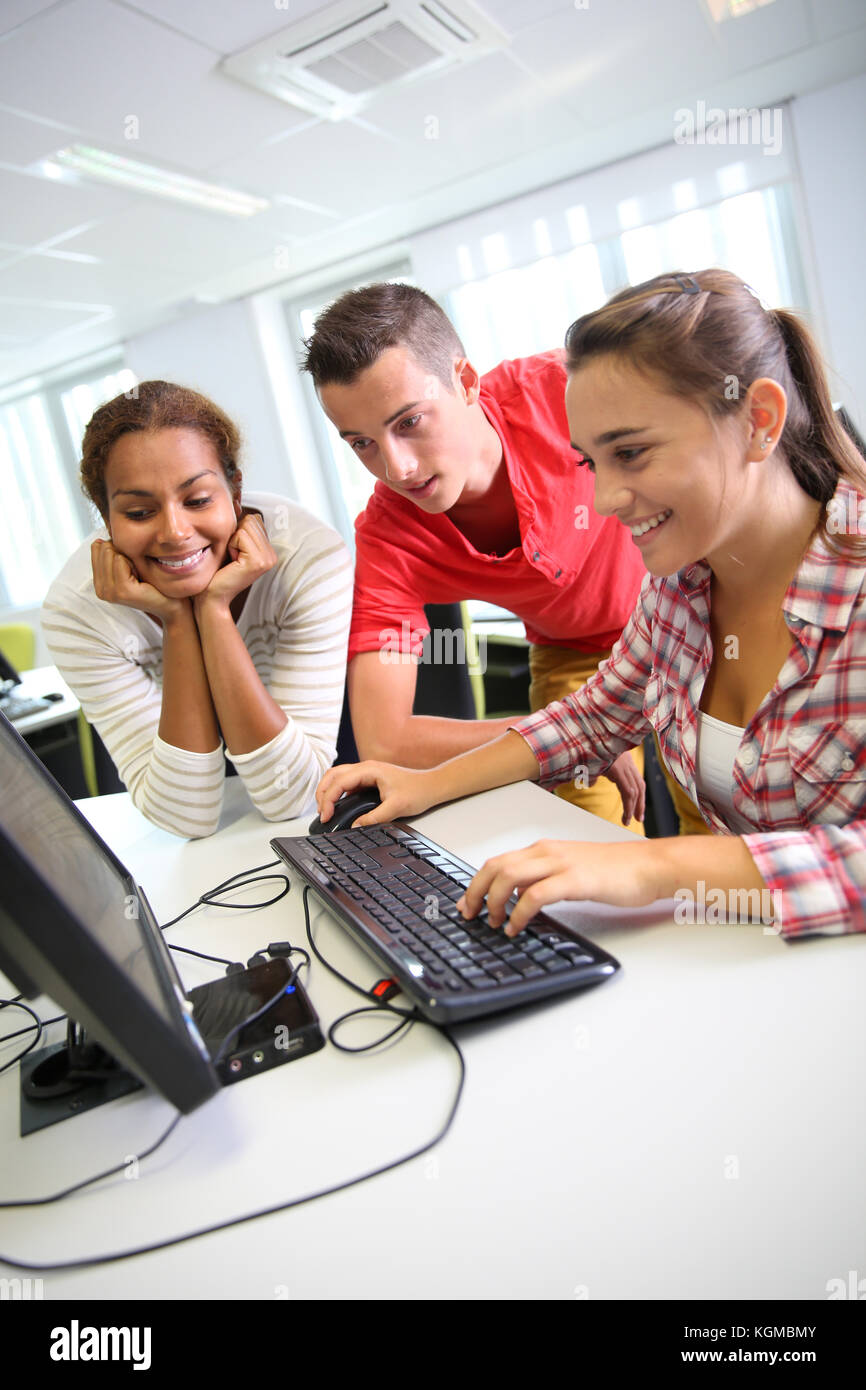 Group of students in computer's laboratory Stock Photo - Alamy