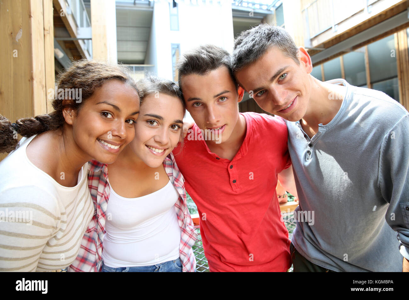 Portrait of cheerful students in college campus Stock Photo - Alamy