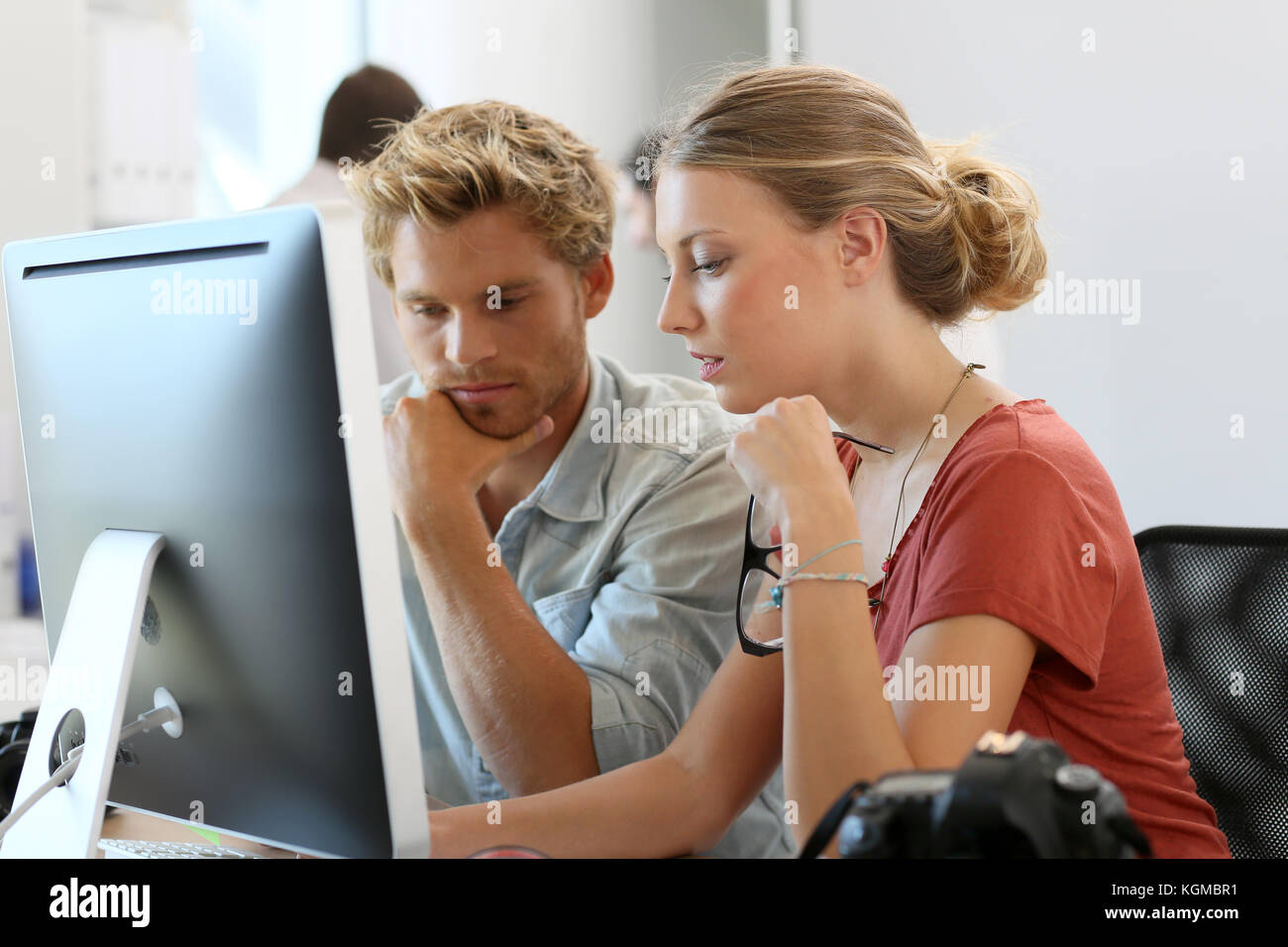 Students in photography working on project Stock Photo - Alamy