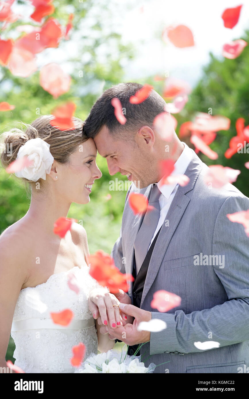 Profile view of bride and groom looking at each other's eyes Stock ...