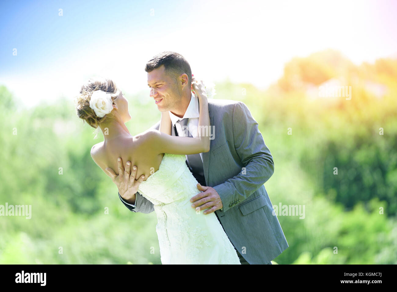 Beautiful bride and groom on their wedding day Stock Photo - Alamy
