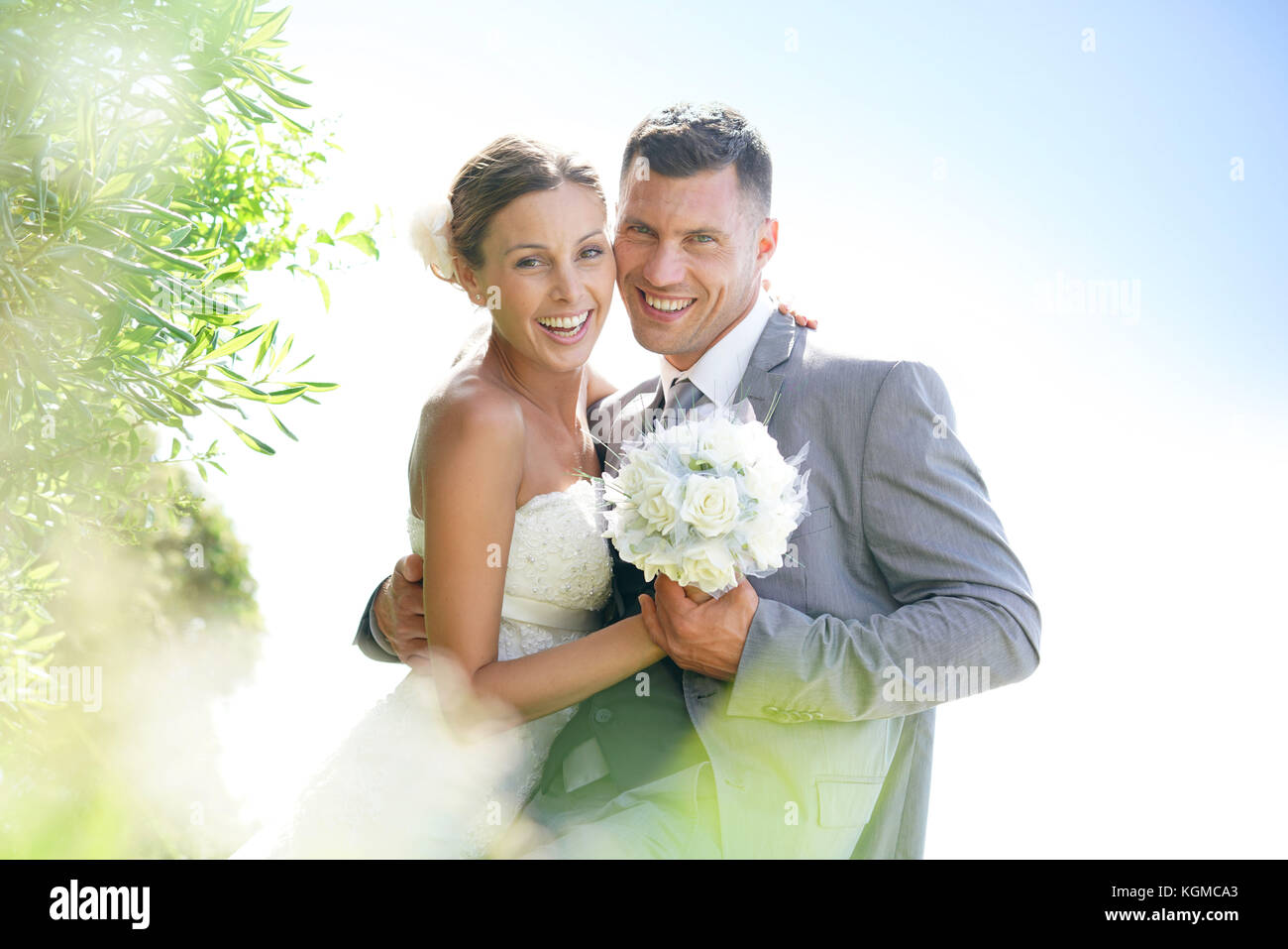 Beautiful bride and groom on their wedding day Stock Photo - Alamy