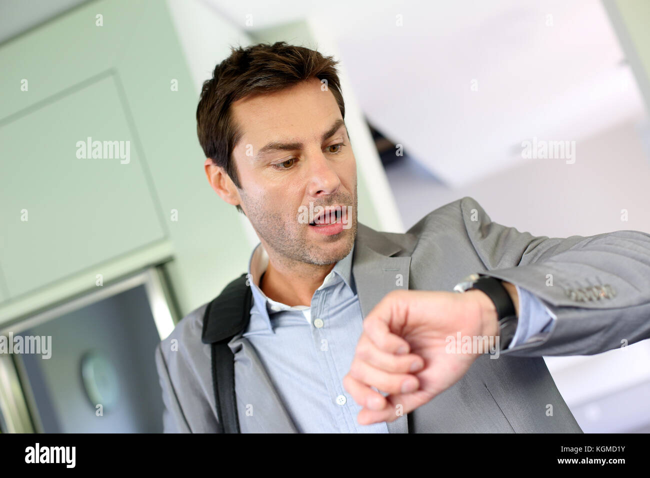 Man Looking Watch Rushing Work High Resolution Stock Photography and ...