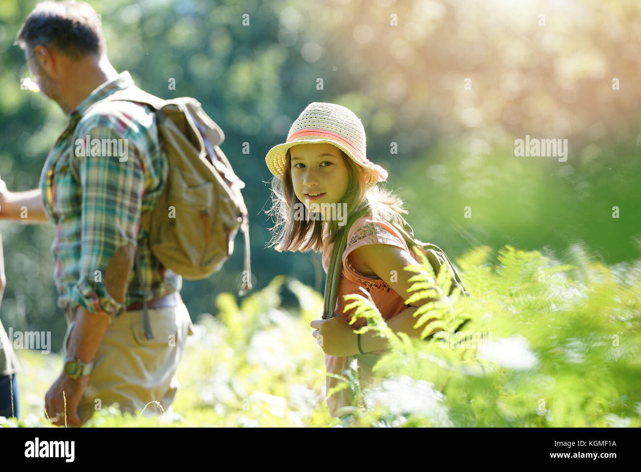 Portrait of young girl on a rambling day with parents Stock Photo - Alamy