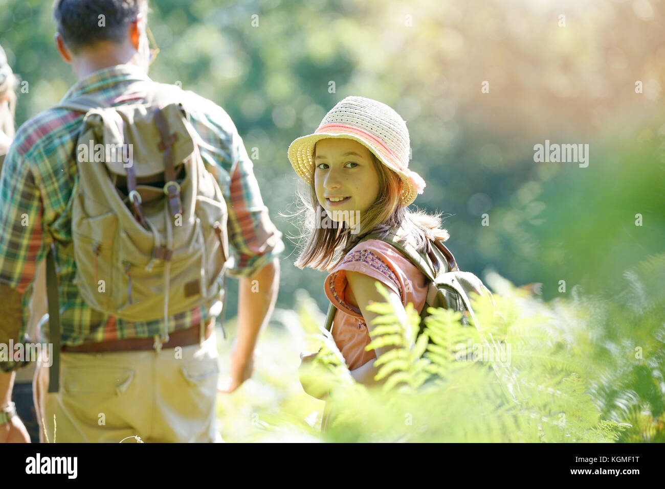 Portrait of young girl on a rambling day with parents Stock Photo - Alamy