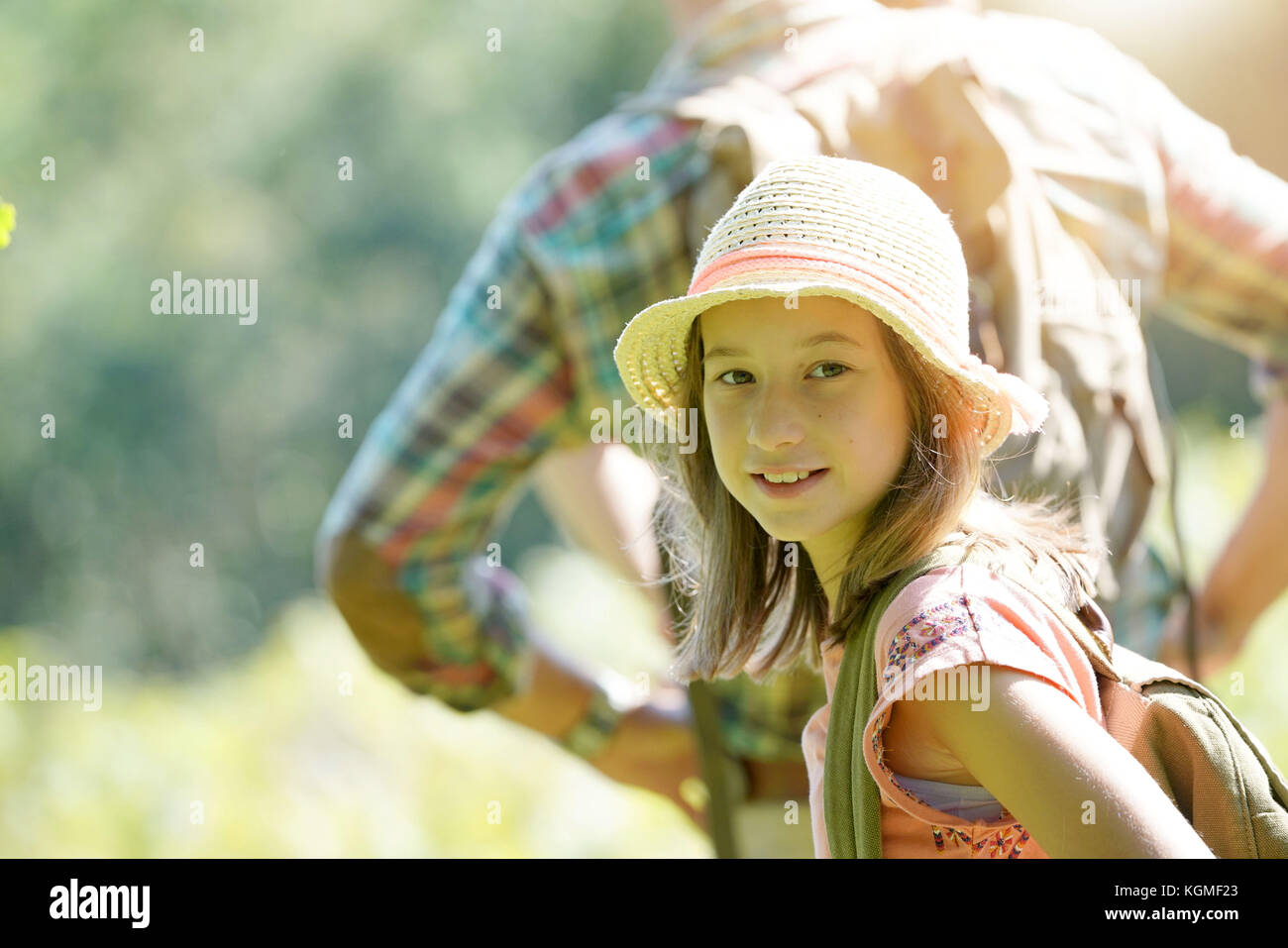 Portrait of young girl on a rambling day with parents Stock Photo - Alamy