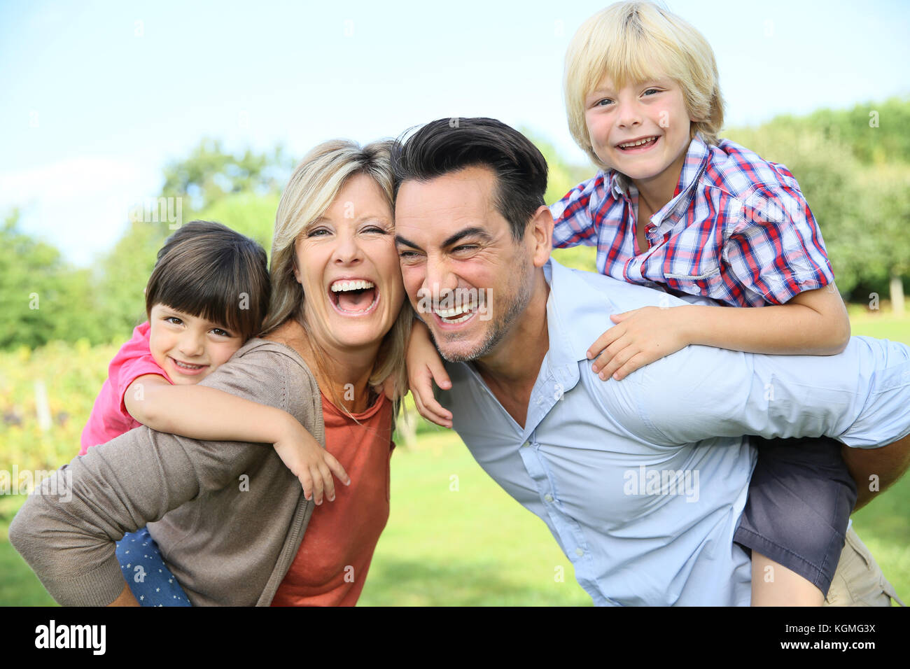 Kids piggyback hi-res stock photography and images - Alamy