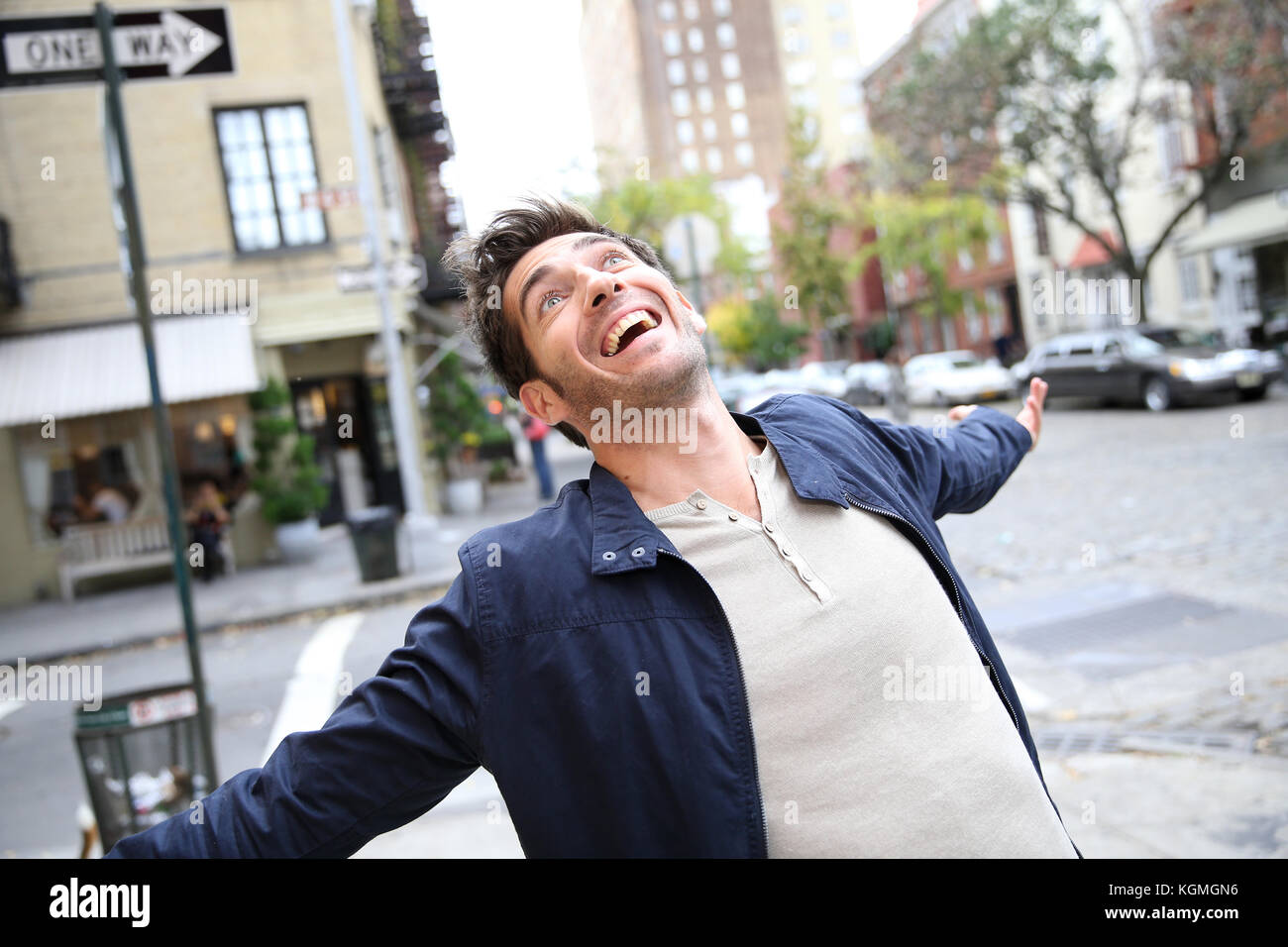 Man expressing happiness and screaming in the street Stock Photo - Alamy