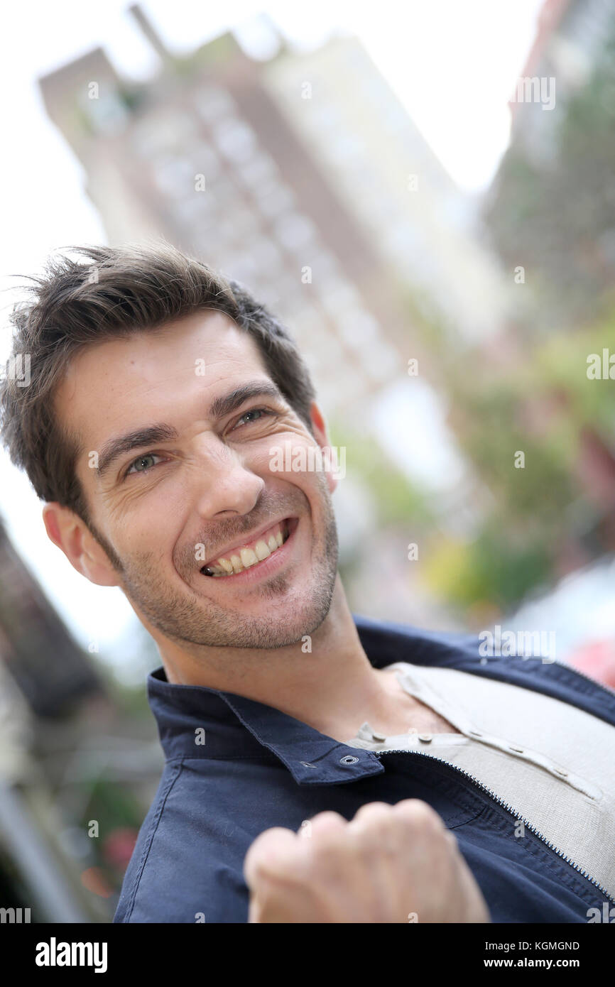 Man expressing happiness and success in the street Stock Photo - Alamy