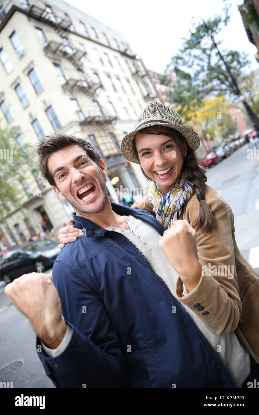 Couple shouting and showing happiness Stock Photo - Alamy