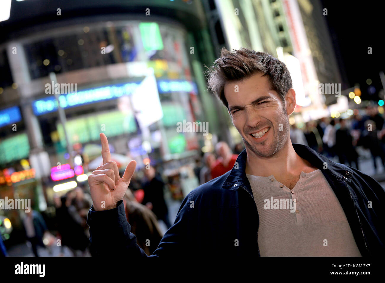 Man standing in Time Square on Broadway street Stock Photo - Alamy