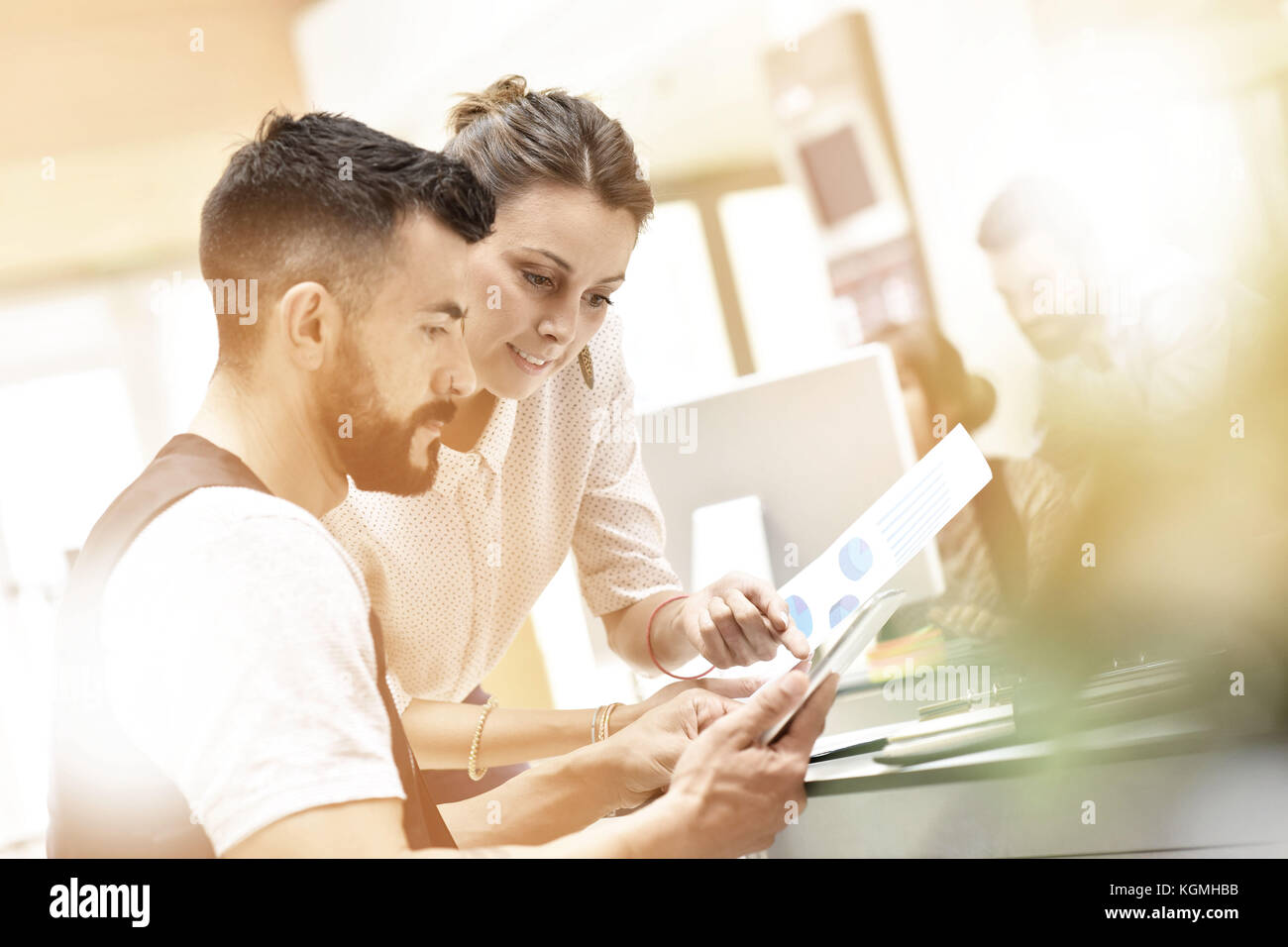 Workteam meeting in office Stock Photo - Alamy
