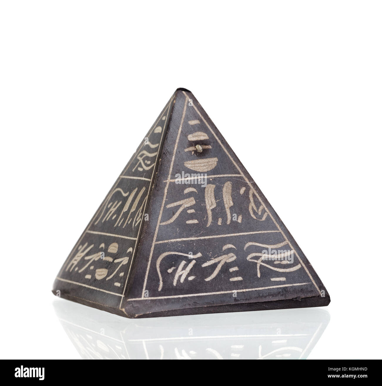 Stone pyramid with Egyptian inscriptions isolated on white background ...