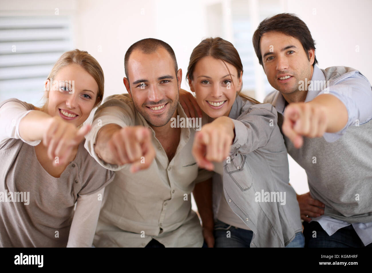 Business people pointing at camera Stock Photo - Alamy