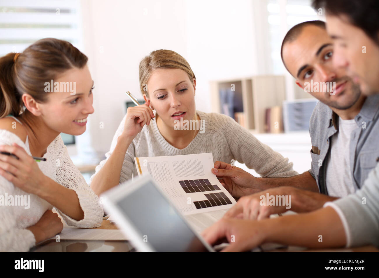 College people studying together in school lounge Stock Photo - Alamy