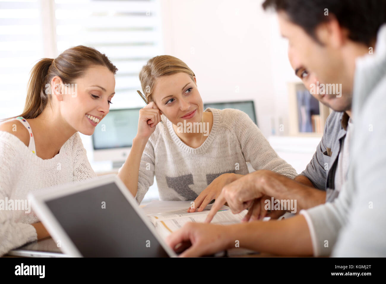 College people studying together in school lounge Stock Photo - Alamy