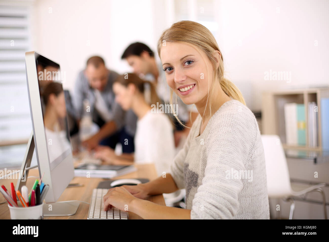 Portrait of beautiful office worker Stock Photo - Alamy