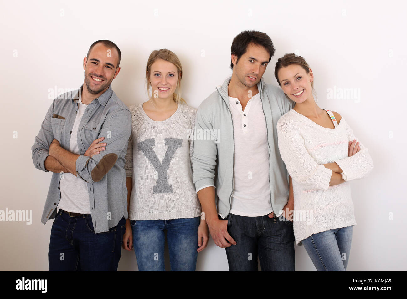Group of smiling friends hanging around Stock Photo - Alamy