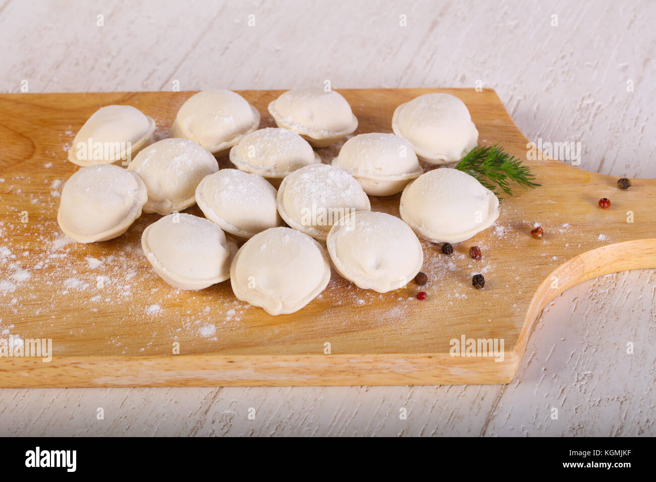 Raw dumplings for cooking Stock Photo - Alamy