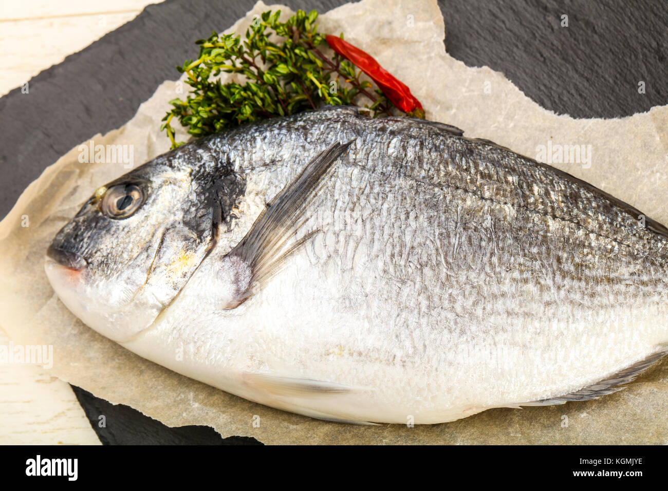 raw dorada fish - ready for cooking Stock Photo - Alamy