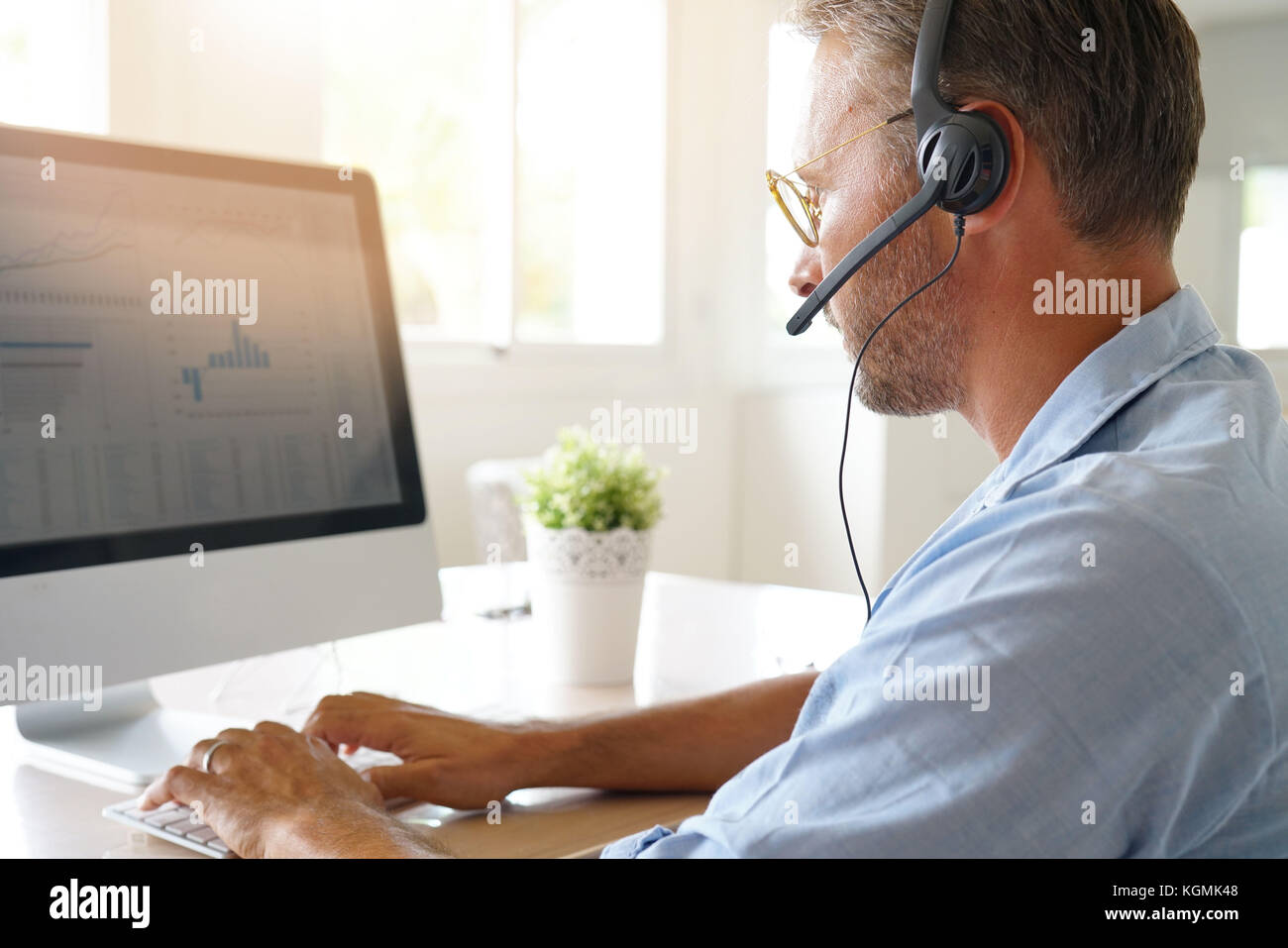Businessman working from home, telework Stock Photo - Alamy