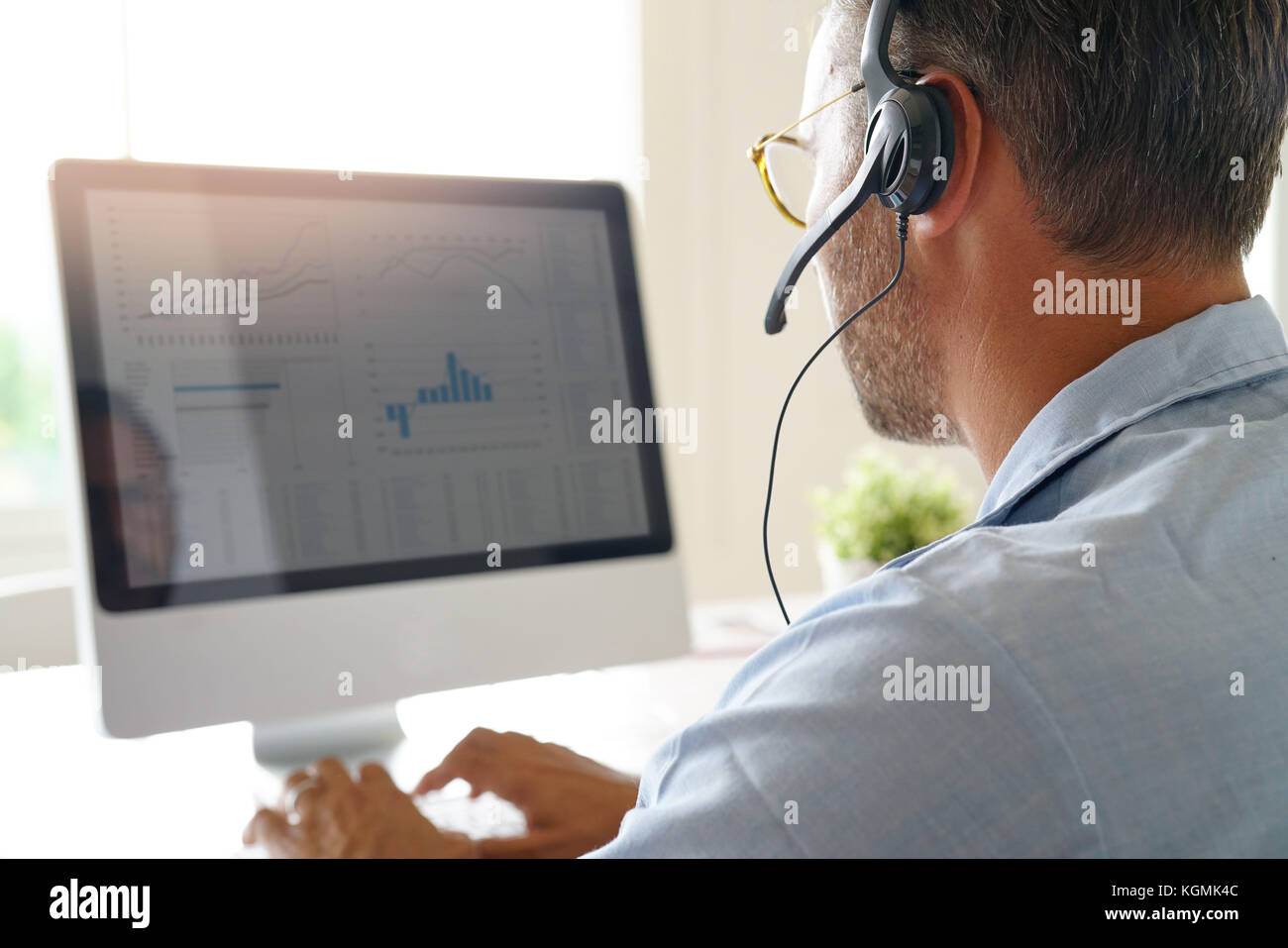 Businessman working from home, telework Stock Photo - Alamy