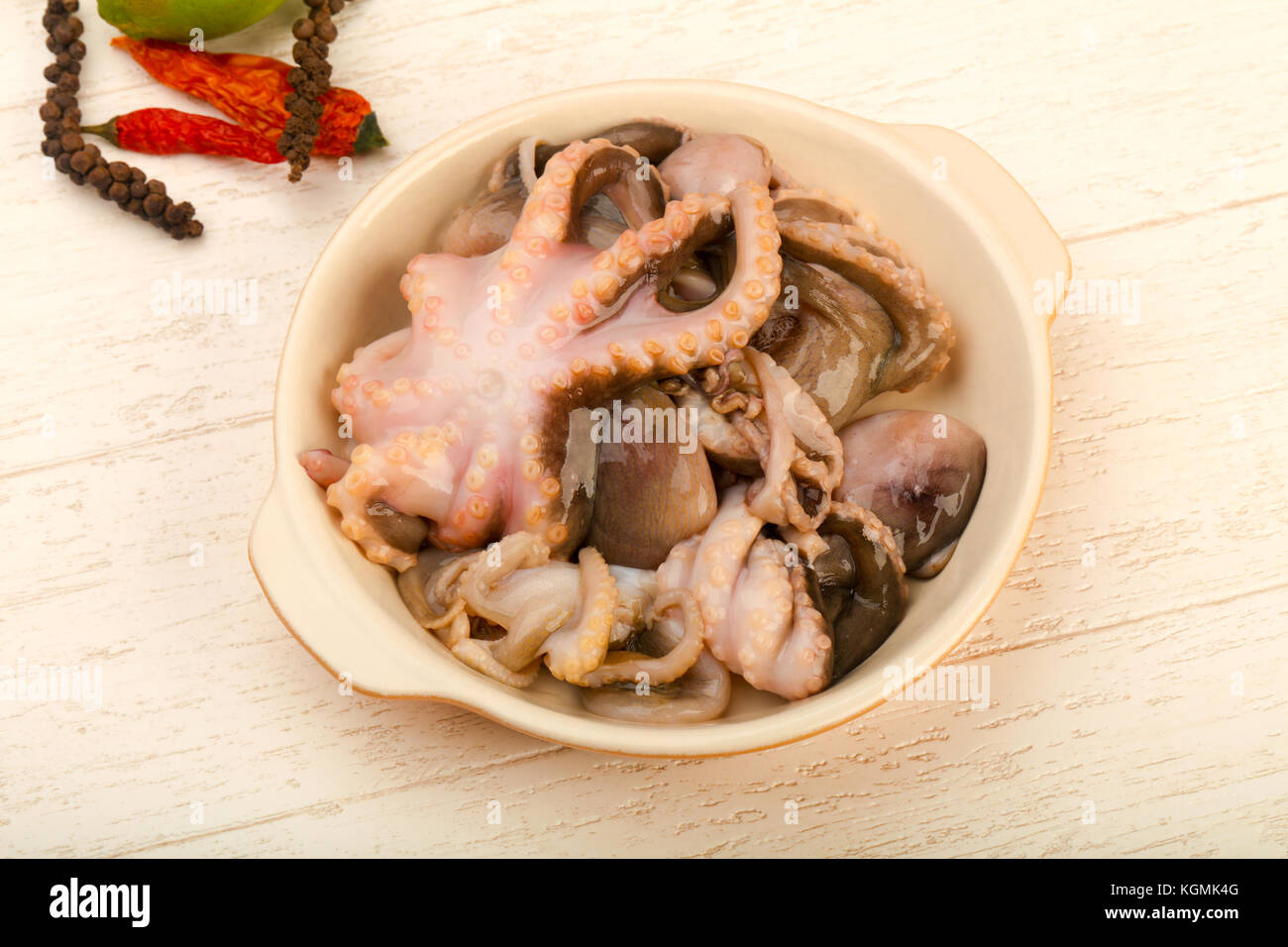 Raw octopus ready for cooking Stock Photo - Alamy