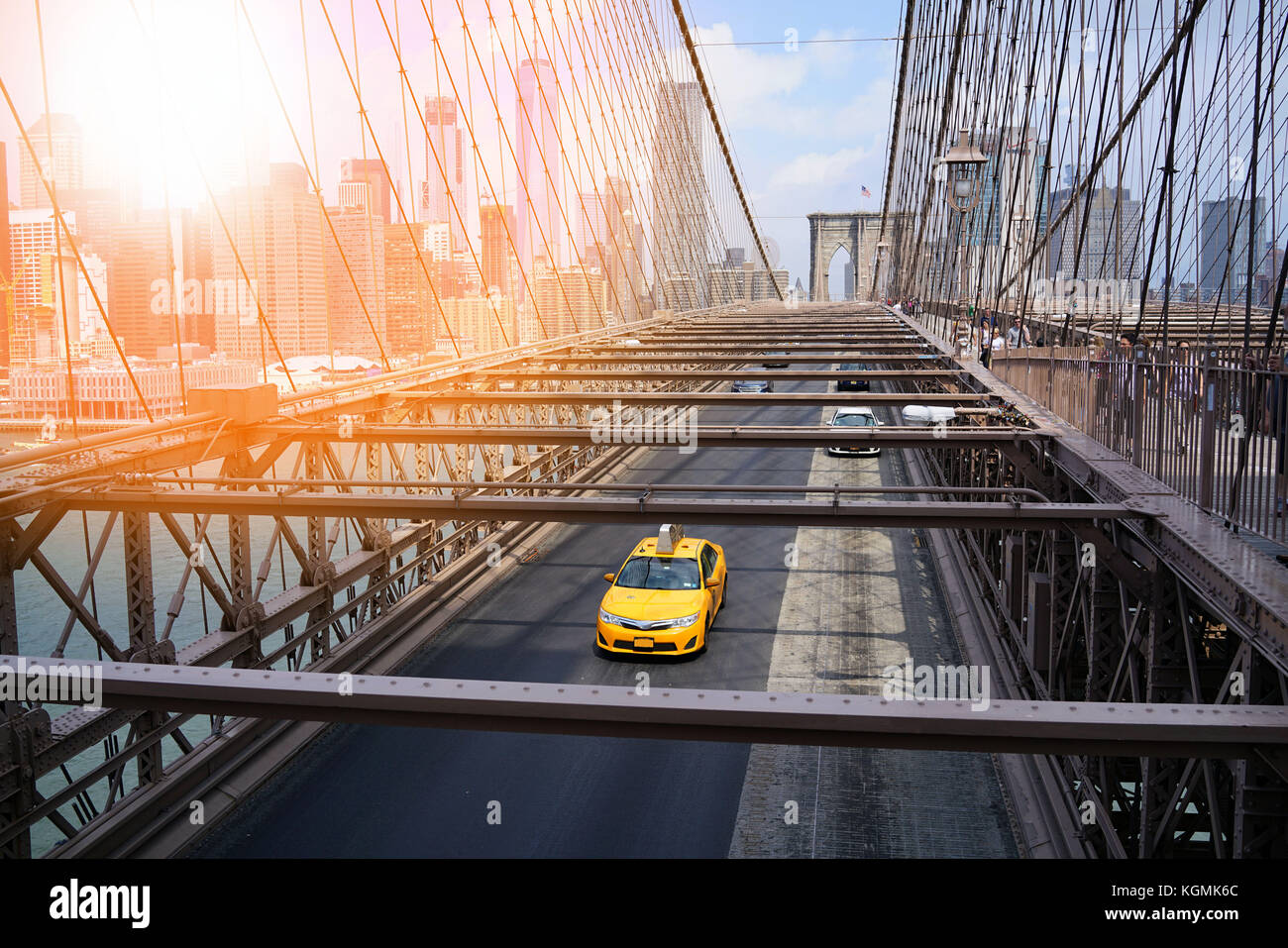 Taxi cab riding on Brooklyn bridge Stock Photo - Alamy