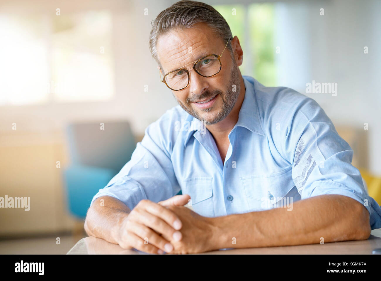 Portrait of handsome 45-year-old man with eyeglasses Stock Photo - Alamy