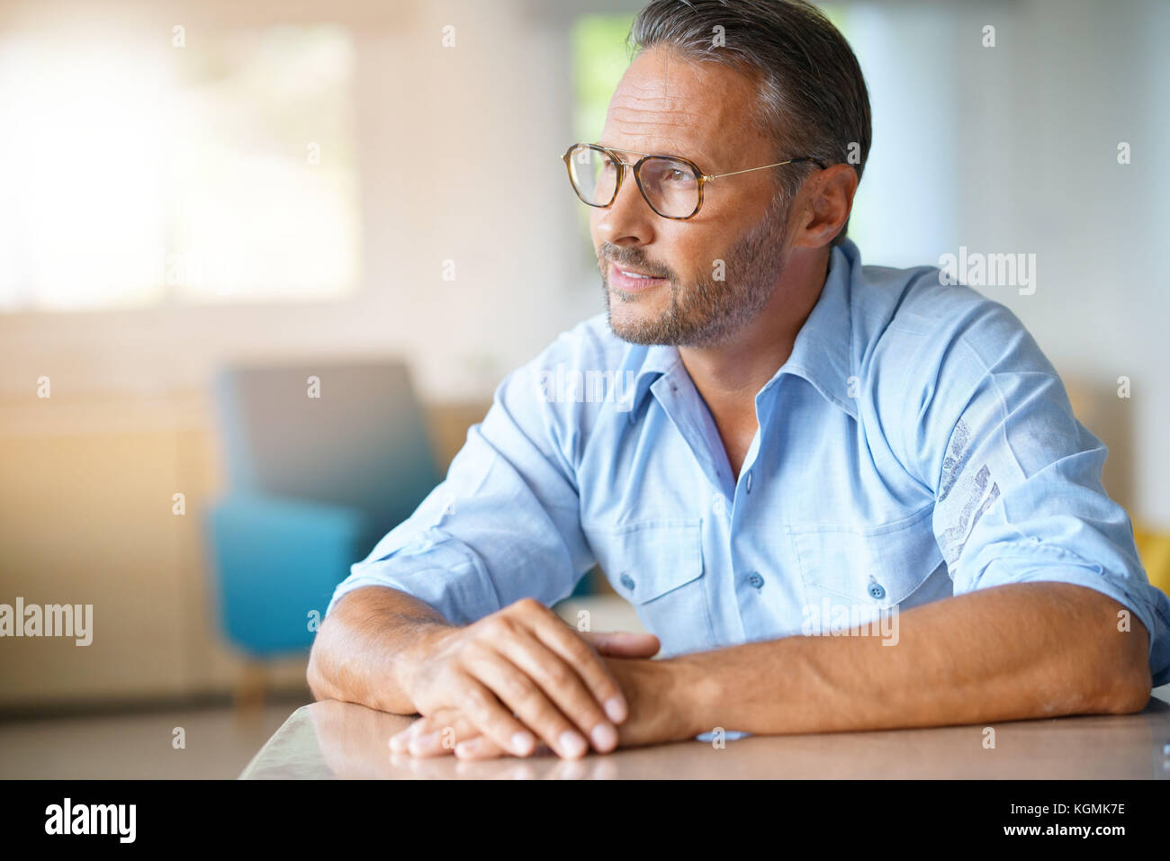 Portrait of handsome 45-year-old man with eyeglasses Stock Photo - Alamy