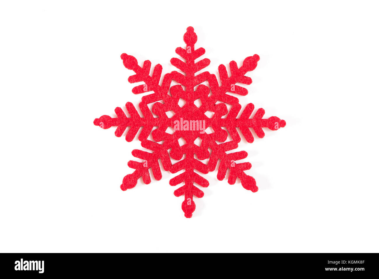 Red decorative snowflake, on white background Stock Photo - Alamy