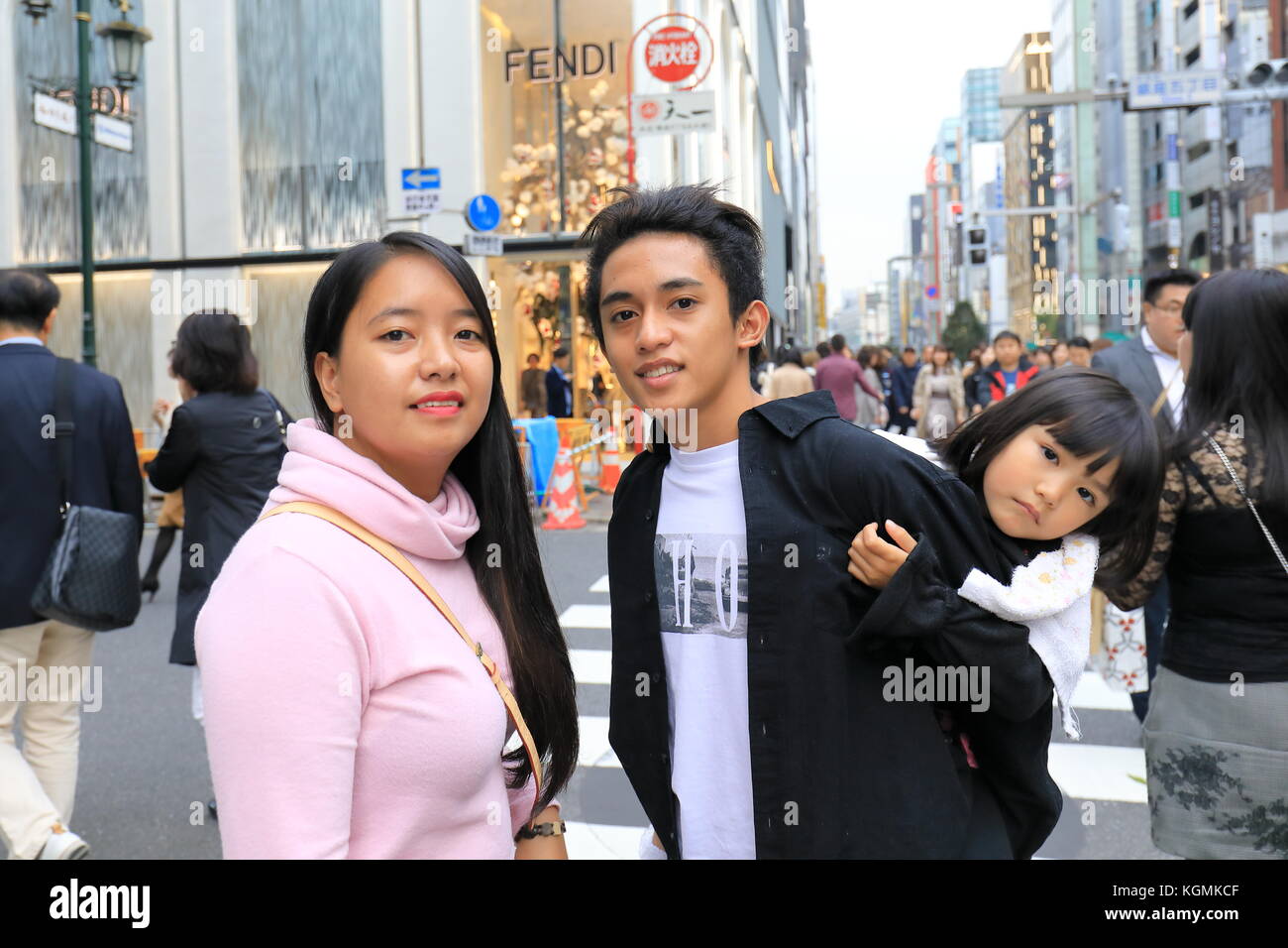 Mixed Race Families in Front of FENDI Ginza Tokyo Japan. Model Release ...