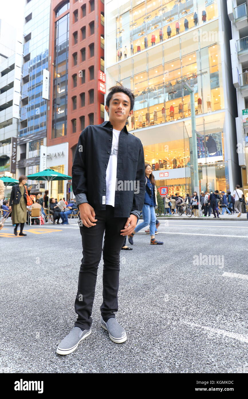 Foreigner in Front of Uniqlo Ginza Tokyo,Japan. Model Release for the ...