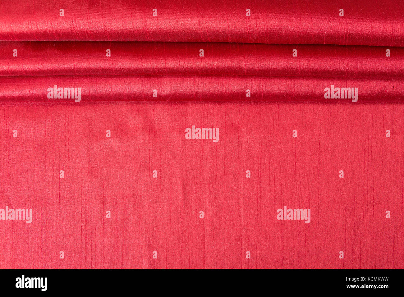 Rich red wavy fabric texture / background Stock Photo - Alamy