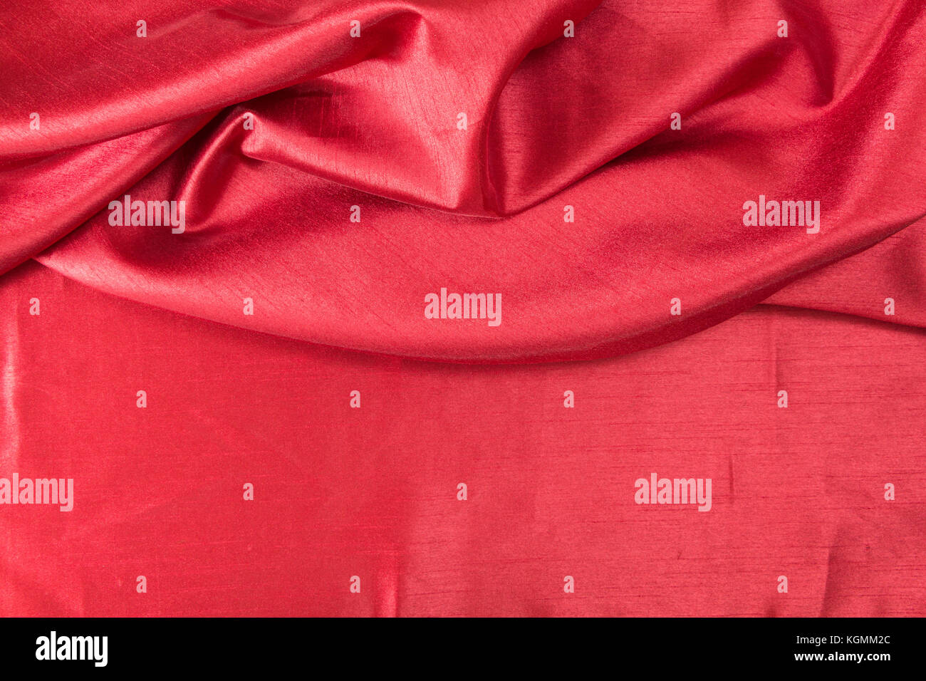 Rich red wavy fabric texture / background Stock Photo - Alamy