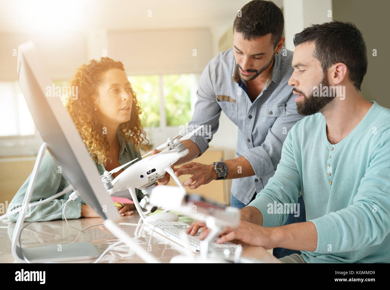 Startup people in office working on drone technology Stock Photo - Alamy