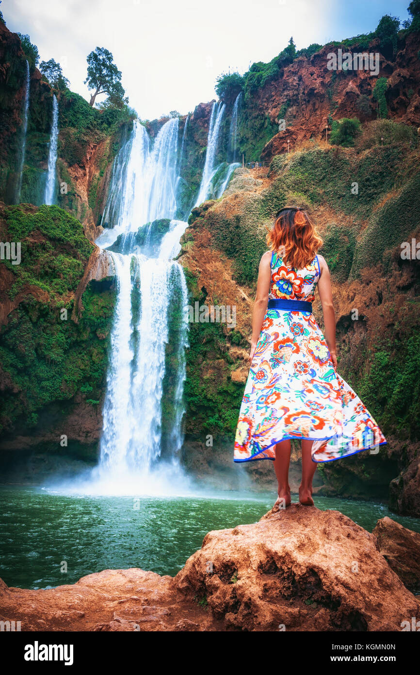 Girl In Front Of A Waterfall Stock Photo - Alamy