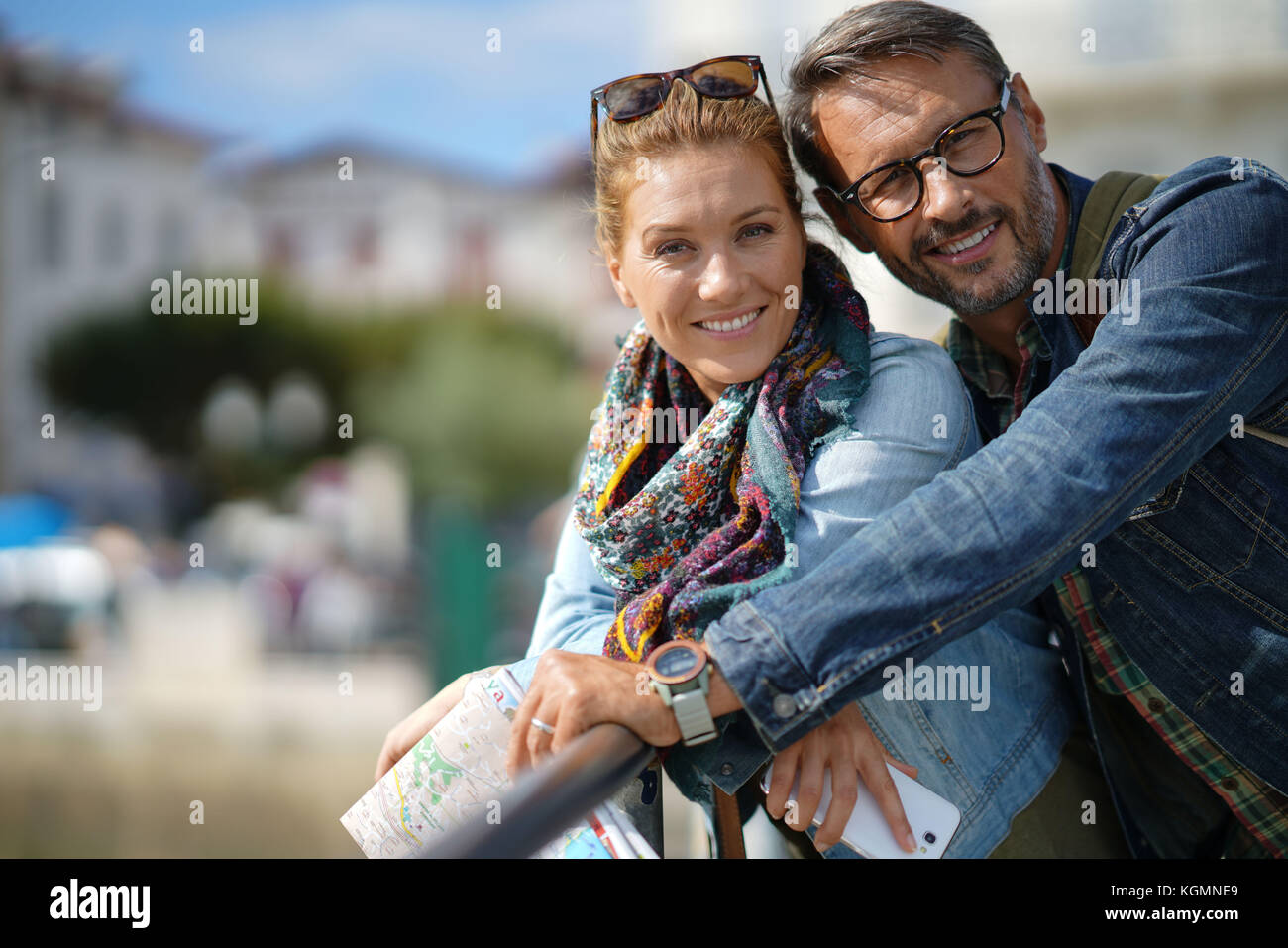 Couple of tourists enjoying beautiful day outside Stock Photo - Alamy