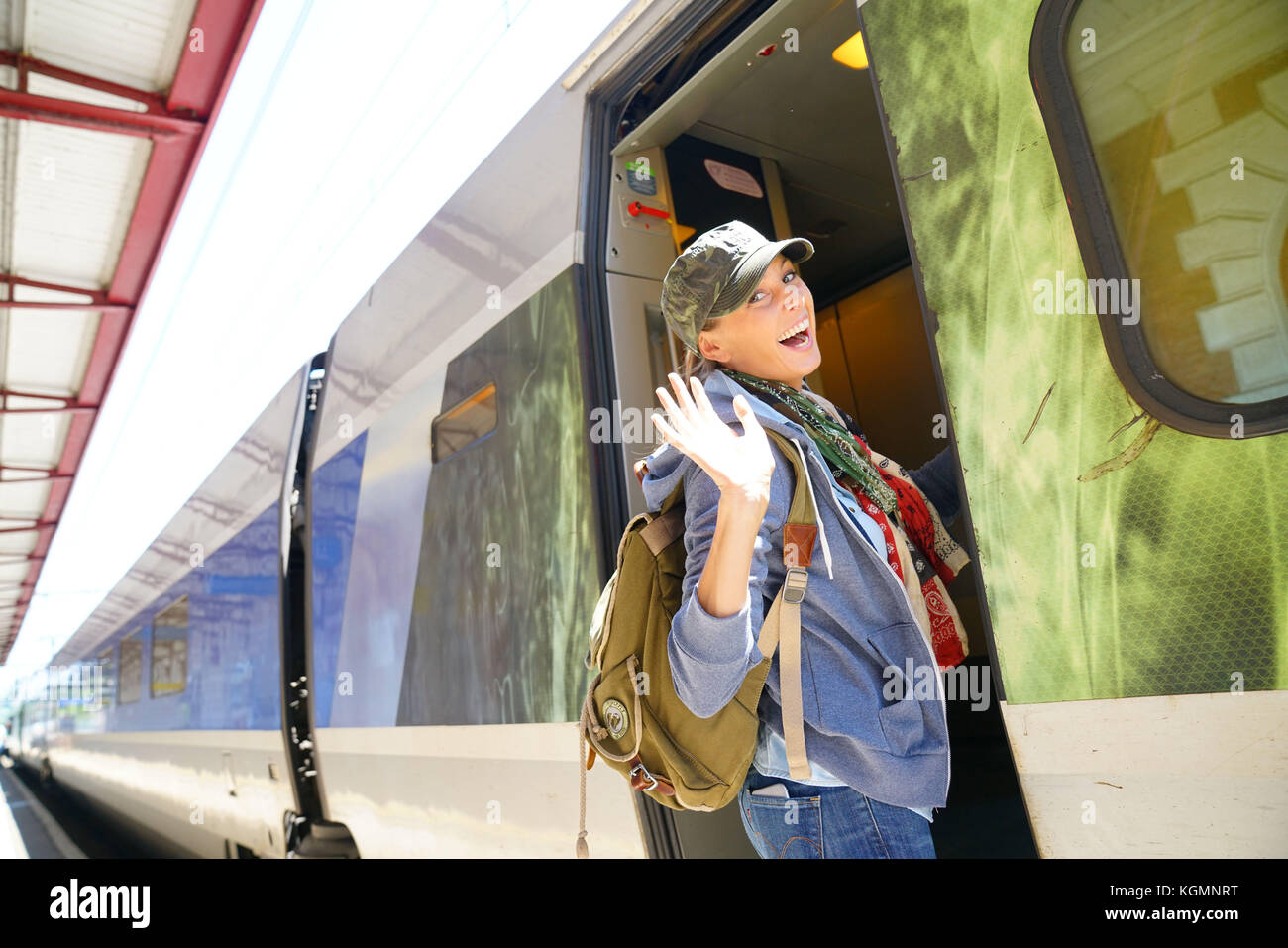 Girl on train station backpack hi-res stock photography and images - Alamy